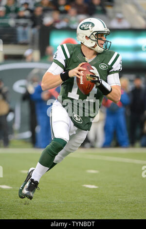 New York Jets quarterback Greg McElroy talks during a post-game news ...