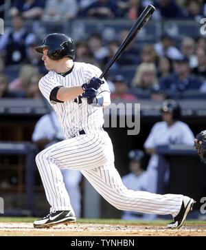 New York Yankees Jayson Nix looks back at the action after scoring on a ...