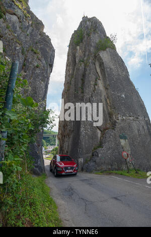 Car driving through Bayard rock in Dinant, Belgium Stock Photo - Alamy