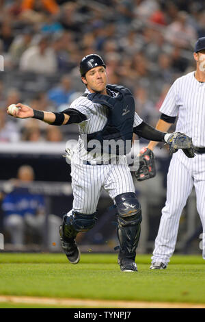 New York Yankees catcher Austin Wells walks on the field before a baseball game against the ...