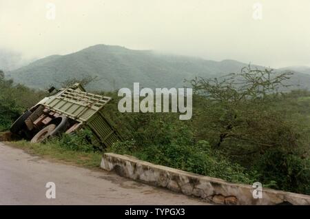 CARGO TRUCK OFF ROAD; TURNED OVER Stock Photo - Alamy