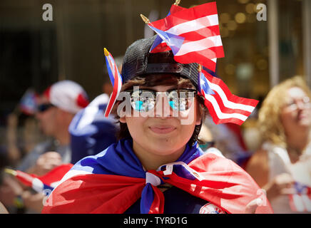 Crowds watch the National Puerto Rican Day Parade, Sunday, June 14 ...