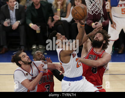 Chicago Bulls watch the second half of an NBA basketball game against ...