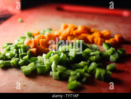 capsicum and carrot cut into small pieces,finely chopped vegetables on ...