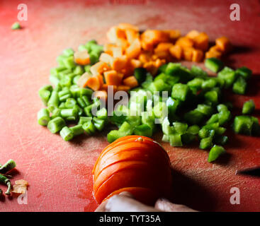 capsicum and carrot cut into small pieces,finely chopped vegetables on ...
