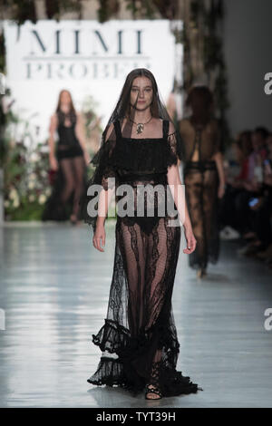 A model walks on the runway at the Mimi Prober fashion show during New ...