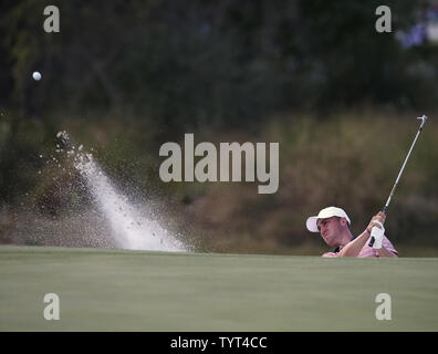Justin Thomas hits from the bunker on the fourth hole during a practice ...