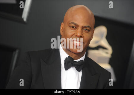 Kevin Frazier arrives at the 60th annual Grammy Awards at Madison ...