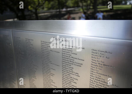 The names of immigrants that passed through Ellis Island etched in a ...