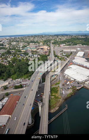 AERIAL VIEW OF THE WEST SEATTLE BRIDGE, HARBOR ISLAND SHIPYARDS, AND ...