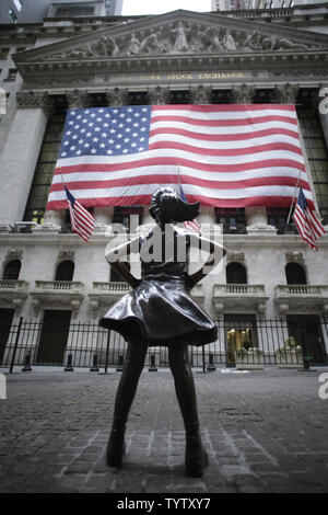 The Fearless Girl statue stands outside of the New York Stock Exchange ...