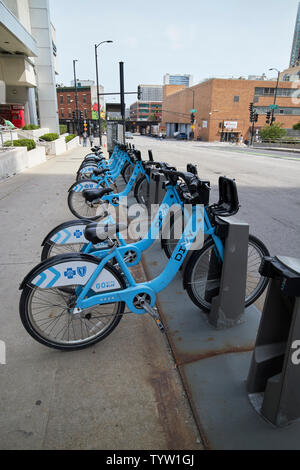 divvy bike sharing scheme docking station with almost all bikes taken ...