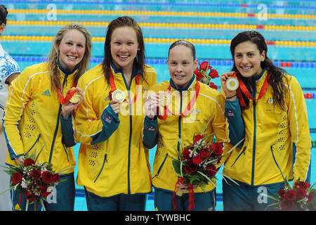 Australia's Kylie Palmer, Bronte Barratt and Stephanie Rice, top from left, celebrate with final ...