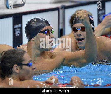 Gold Medalist Matthew Grevers of the United States (L) and teammate and ...