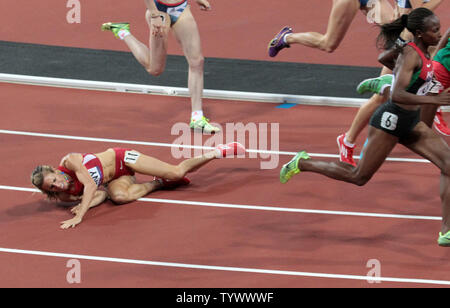 America's Morgan Uceny falls in the Women's 1500 metres final on the ...