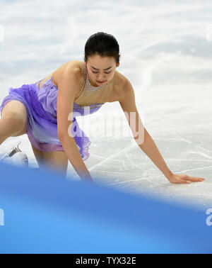 Japan's Mao Asada falls during her gold medal winning free skating ...