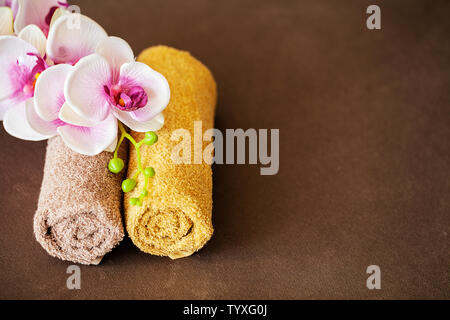 Chocolate Spa . Composition brown towel in hotel room of spa treatment ...