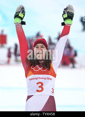 Switzerland's Michelle Gisin celebrates on the podium after winning the ...