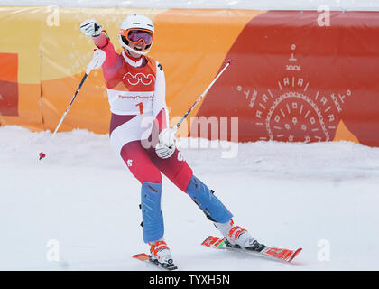 Switzerland's Michelle Gisin celebrates on the podium after winning the ...