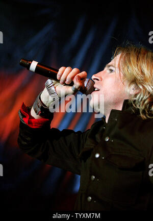 Marty Casey, lead singer for the rock group Lovehammers, performs in ...