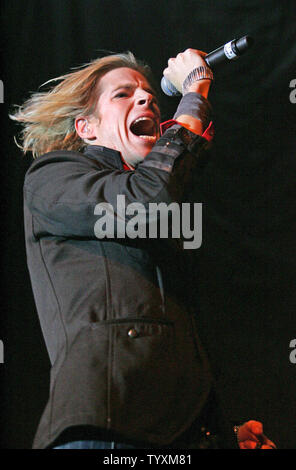Marty Casey, lead singer for the rock group Lovehammers, performs in ...