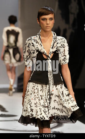 A model wears a creation by South Korean designer Sylvia Oh during a ...