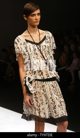 A model wears a creation by South Korean designer Sylvia Oh during a ...