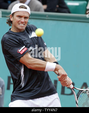 American Robert Kendrick hits a shot during his French Open second ...