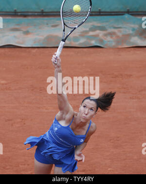Serbian Jelena Jankovic hits a serve during her French Open semifinal ...