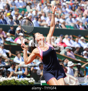 Serbian Jelena Jankovic hits a serve during her French Open semifinal ...