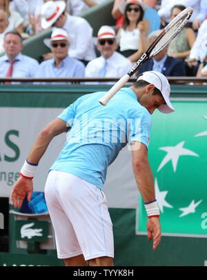 Novak Djokovic throws his racket during his Wimbledon 2025 Men's ...