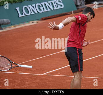 Novak Djokovic throws his racket during his Wimbledon 2025 Men's ...