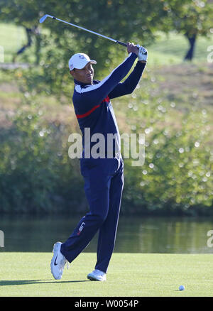 Tiger Woods participates in a practice session at Le Golf National in ...