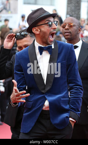 French photographer JR arrives on the red carpet before the screening ...