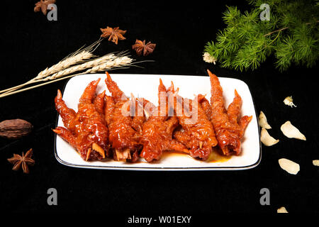 Tiger skin, phoenix claws, halogen chicken claws Stock Photo - Alamy