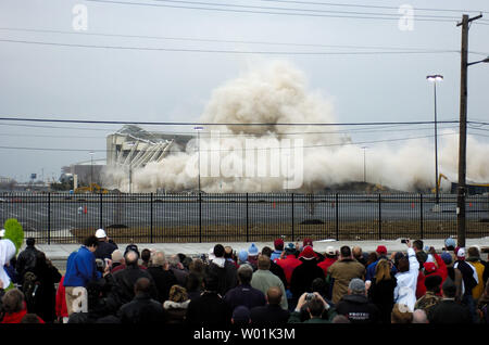 Veterans Stadium comes tumbling down in a series of explosions as a ...