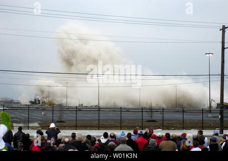 Veterans Stadium comes tumbling down in a series of explosions as a ...