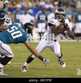 Jacksonville Jaguars' Russell Allen (50) tries to tackle Buffalo Bills ...