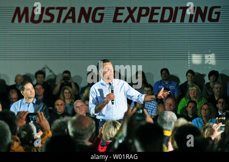 Sen. Mitt Romney speaks during a news conference following a tour with ...