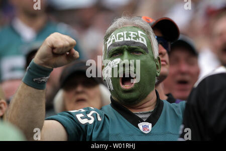 Fans cheer during an NFL football game between the Baltimore Ravens and ...