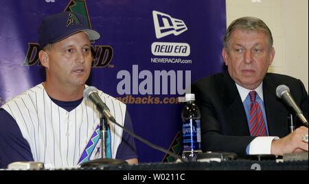 Arizona Diamondbacks owner Jerry Colangelo, left, presents pitcher ...