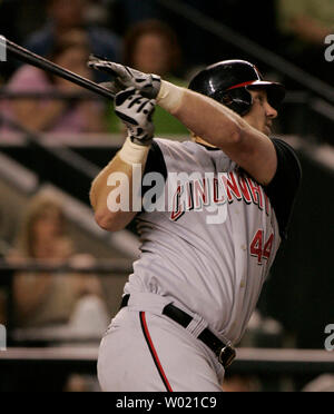 Cincinnati Reds' Adam Dunn watches his home run during the ninth inning ...