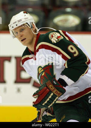Minnesota Wild center Mikko Koivu (9) pauses on the ice during the ...