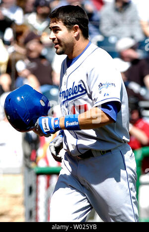Los Angeles Dodgers' Jason Repko is hit on the elbow by a pitch from ...