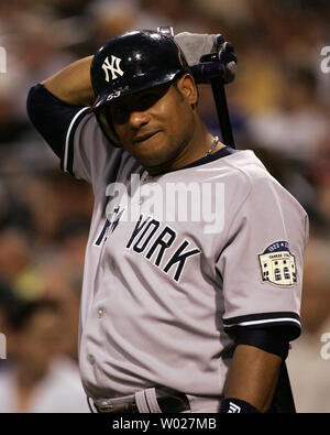 New York Yankees Bobby Abreu, background, rounds the bases after ...