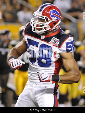 Pittsburgh Steelers defensive end Aaron Smith sits on the sidelines ...