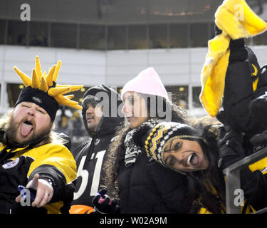 A New York Jets fan celebrates during the first half of an NFL football ...