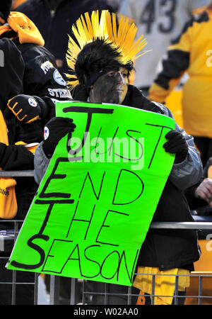 A fan before the NFL AFC Championship football game between the Kansas ...