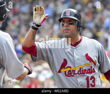 St. Louis Cardinals' Gerald Laird celebrates on the field after his ...