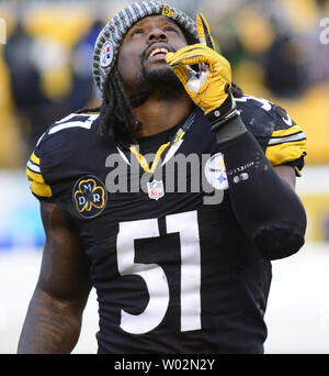 Pittsburgh Steelers linebacker Sean Spence (51) is tended to by ...